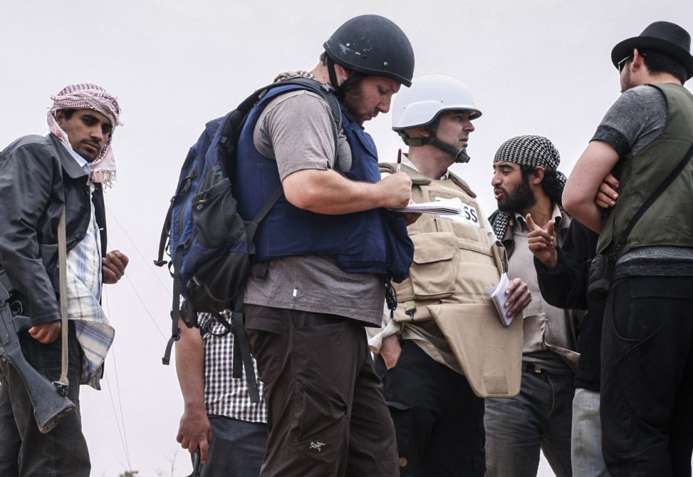 Video Purports To Show Beheading Of U.S. Journalist | Here & Now